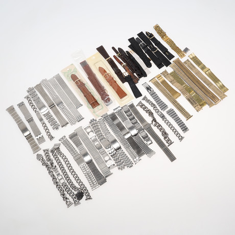 A Collection OF WATCH LINKS AND STRAPS, approx. 50 pcs. Clocks ...