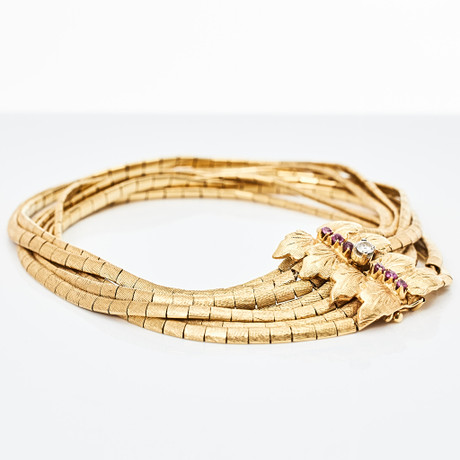 BRACELET, 18k satin gold, 7 rows of semi-articulated links, at clasp ...