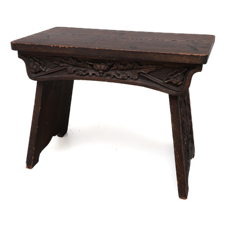 A TUDOR STYLE CARVED OAK LOW TABLE. Furniture - Tables - Auctionet