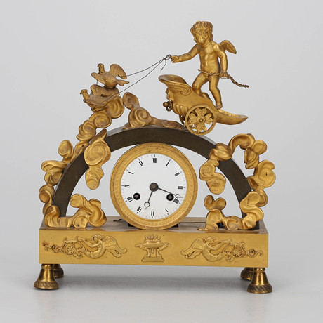 TABLE CLOCK, Empire with putto, bronze, patinated and gilded, 19th ...