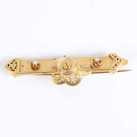 BROSCH i 18K guld. Smycken & Ädelstenar - Broscher & Hängen - Auctionet