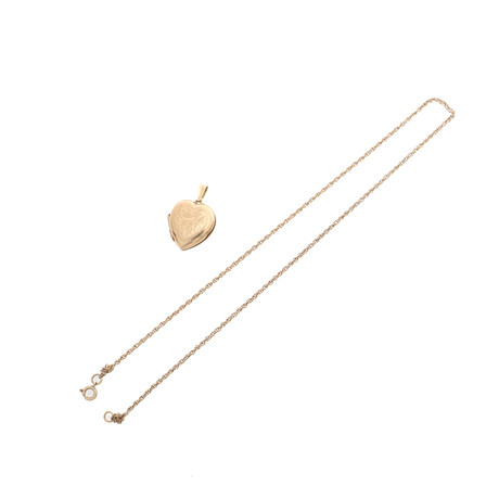 A 9 CARAT GOLD HEART SHAPED LOCKET AND NECK CHAIN. Jewellery ...
