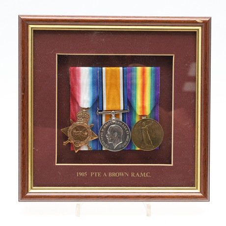 A GROUP OF THREE FIRST WORLD WAR MEDALS AWARDED TO PTE A. BROWN R.A.M.C ...