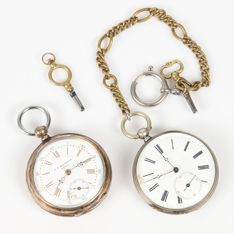 POCKET WATCH, 2 pieces, so-called key puller, incl. a. silver. Clocks ...
