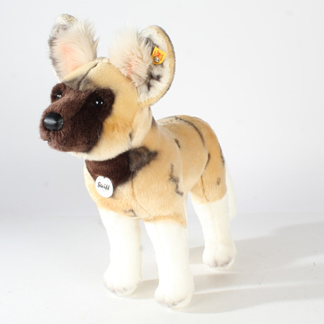 STEIFF AFRICAN WILD DOG WITH BUTTON AND LABEL. Toys - Toys - Auctionet