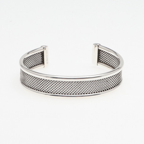 A TIFFANY & CO SILVER MESH TORQUE BANGLE. Jewellery & Gemstones ...