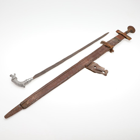 A TURAG TYPE SWORD AND SCABBARD AND ANOTHER SIMILAR. Weapons ...