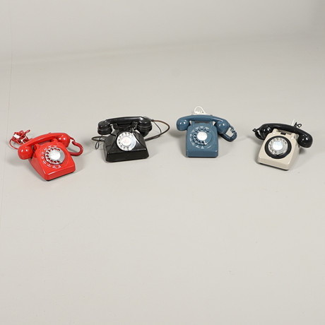 A 1940S BLACK 'WHITEHALL' ROTARY DIAL TELEPHONE AND THREE MODERN ROTARY ...