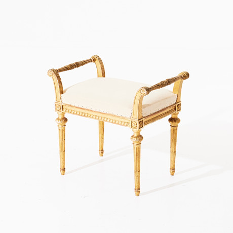 TABURET, early 20th century, Gustavian style, gilded decor, dressed in ...