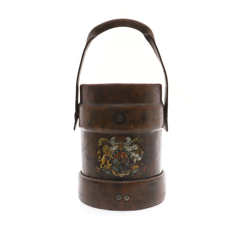 A SECOND WORLD WAR CYLINDRICAL BROWN LEATHER COVERED CARTRIDGE/SHELL ...