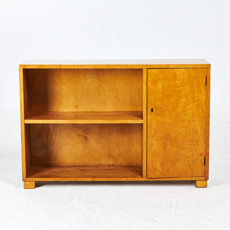 BOKHYLLA. 1900-talets mitt, skåpsdel med ett hyllplan, fanér i björk ...