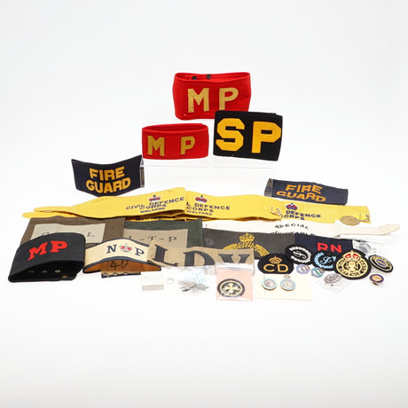 A COLLECTION OF CIVIL DEFENCE CORPS ARM BANDS, BADGES AND OTHER SIMILAR ...