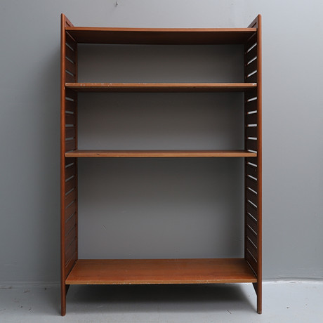 A STAPLES LADDERAX TEAK RANGE OF SHELVING, IN TWO BAYS, CIRCA 1960'S ...