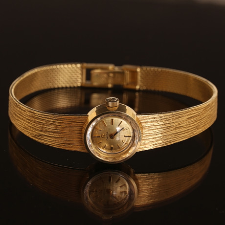 WOMEN'S WATCH, Omega 18k gold. Clocks & Watches - Wristwatches - Auctionet