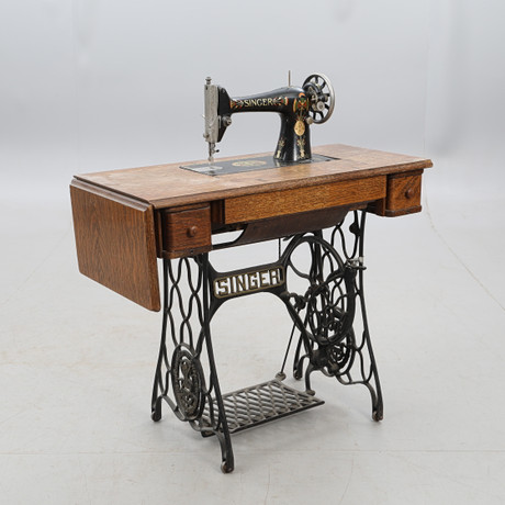 SEWING MACHINE TABLE, Singer, cast iron stand. The first part of the ...