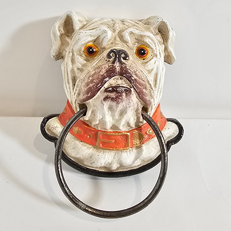 HEAD OF DOG WITH RING TO SUBJECT. IN HIRRO CAST PATINATED AND PAINTED ...