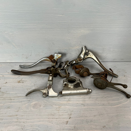 A Collection OF EARLY HAND CONTROL PARTS, 7 parts, i.a. Doherty & AMAC ...