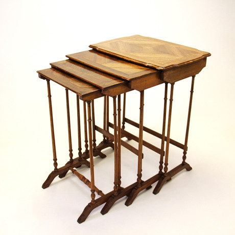 NEST OF FOUR TABLES. Furniture - Tables - Auctionet