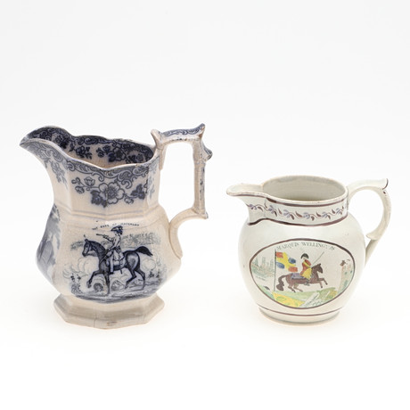MILITARY INTEREST: TWO 19TH CENTURY POTTERY DUKE OF WELLINGTON JUGS ...
