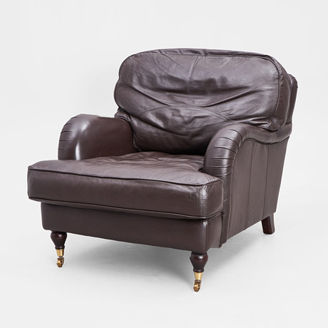 PARKER KNOLL, Fåtölj, svart läder, 'Howard'. England. Samtida. Möbler ...