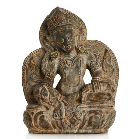 A NEPALESE BLACK STONE STEELE OF JAMBHALA. Asiatica - Auctionet