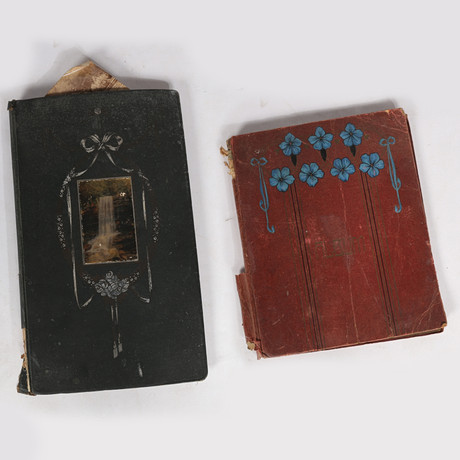 TWO EARLY 20TH CENTURY POSTCARD ALBUMS AND A LEATHER ALBUM OF EDWARDIAN ...