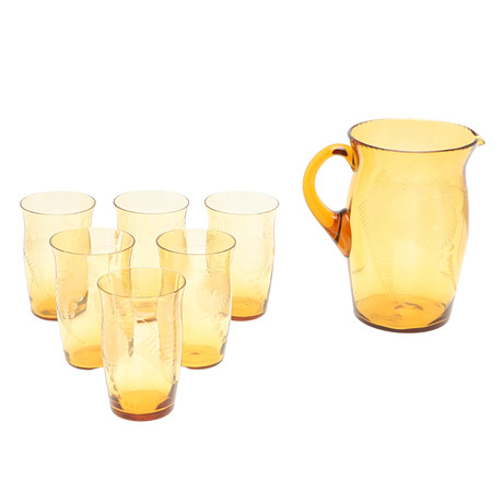 A CUT AMBER GLASS SEVEN PIECE LEMONADE SET. Glass - Tableware - Auctionet