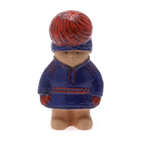 LISA LARSON. A stoneware figurine, the Sami boy “Nils” from the series ...