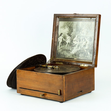 An early 20th century German jacaranda music box with 9 metal plates ...