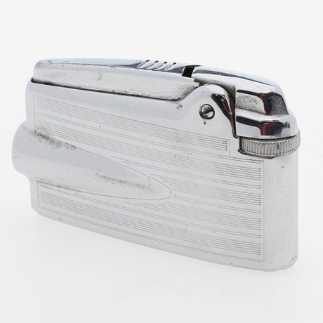 A metal lighter, Ronson, varaflame, England. Miscellaneous ...