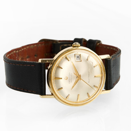 CERTINA, Wristwatch, 14k gold, plexi, with date counter, black leather ...