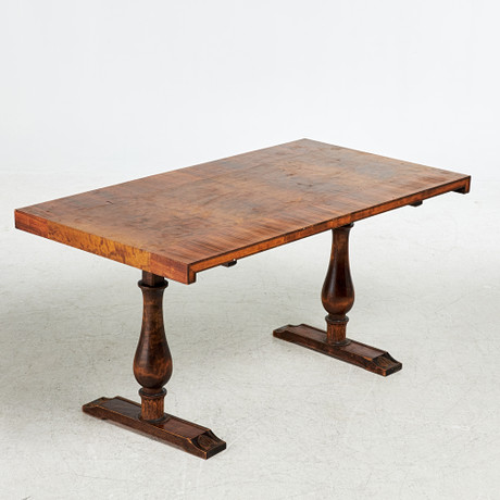ERIC CHAMBERT. A table, 1930s, veneered in bonded flame birch and ...