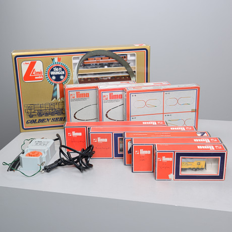 MODEL TRAIN PARTS, including locomotives, wagons, rails, Lima, Italy ...