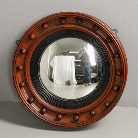 A REGENCY STYLE MAHOGANY 'BULLSEYE' MIRROR. Mirrors - Auctionet
