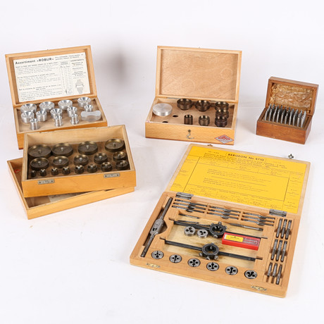A WATCHMAKER'S STAKING SET CONTAINING 60 BITS, THREE ROBUR AND OTHER ...