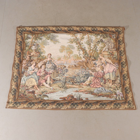 Un tapiz, de estilo rococó, forrado y montado con marco tejido, del ...