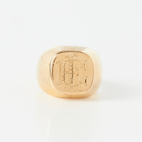 A SIGNET RING, 18k gold, monogram-engraved heel, Gold & Silver G ...