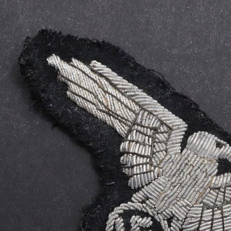 A SECOND WORLD WAR GERMAN WAFFEN SS OFFICER'S ARM EAGLE. Weapons ...