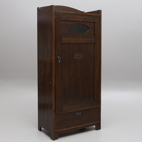 A cupboard, “The Apple”, with oval glass window, Art Nouveau, early ...
