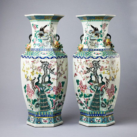 A LARGE PAIR OF HEXAGONAL FAMILLE ROSE VASES, decorated with birds and ...