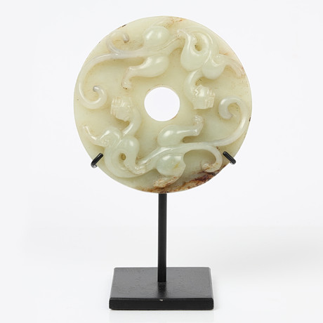 A CHINESE CARVED RUSSET JADE 'BI' DISC. Asiatica - Auctionet