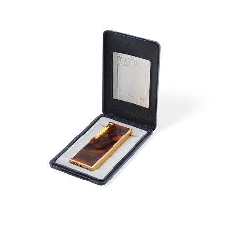 A 20th century Monic lighter. Miscellaneous - Miscellaneous - Auctionet
