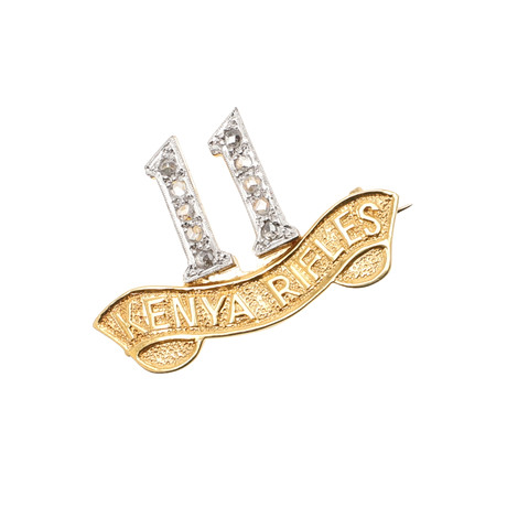 A DIAMOND AND GOLD REGIMENTAL BROOCH FOR THE 11TH BATTALION KENYA ...