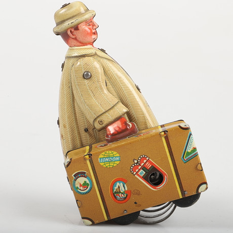 FRITZ VOIGT. Toy, man with suitcase, lithographed sheet metal, Made in ...