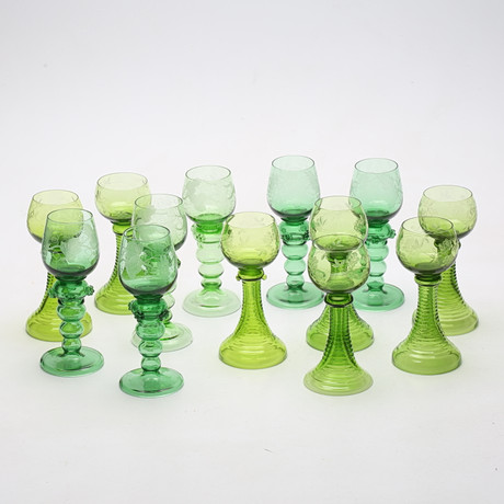 A set of 13 white wine glasses, different models, so-called straps ...