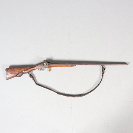 An early 19th century double-barrelled, black powder breech-loading ...