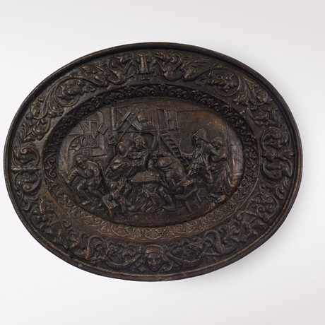A 20th-century cast iron wall plate. Silver & Metals - Other metals ...