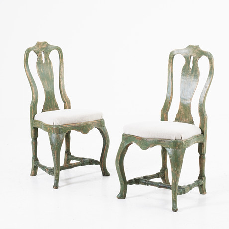 A pair of chairs, mid 18th century, rococo, baluster-shaped back tray ...