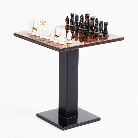 CHESS GAME, table on pillar base, lacquered wood, painted pieces in art ...