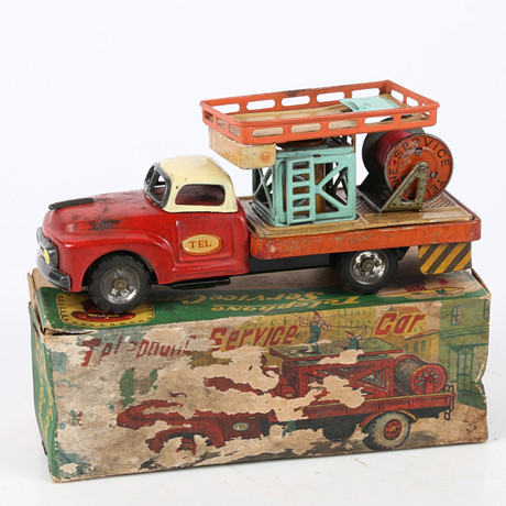 YOSHIYA. A JAPANESE TINPLATE TELEPHONE SERVICE CAR. Toys - Toys - Auctionet